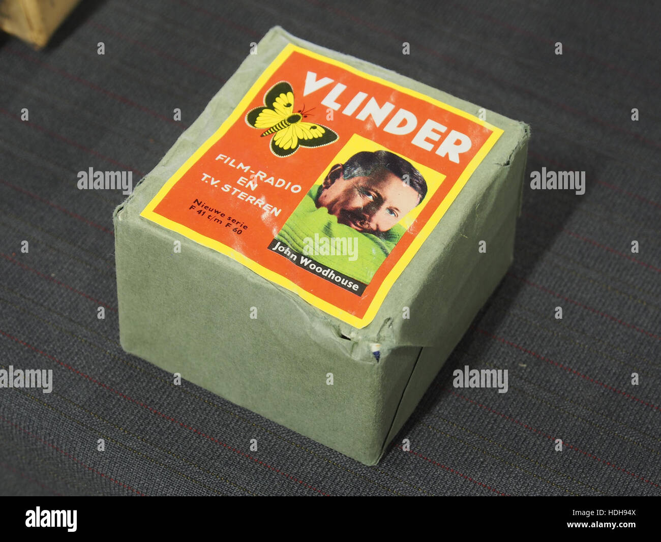 The *Vlinder lucifers pak* features an illustration of a matchbox ...