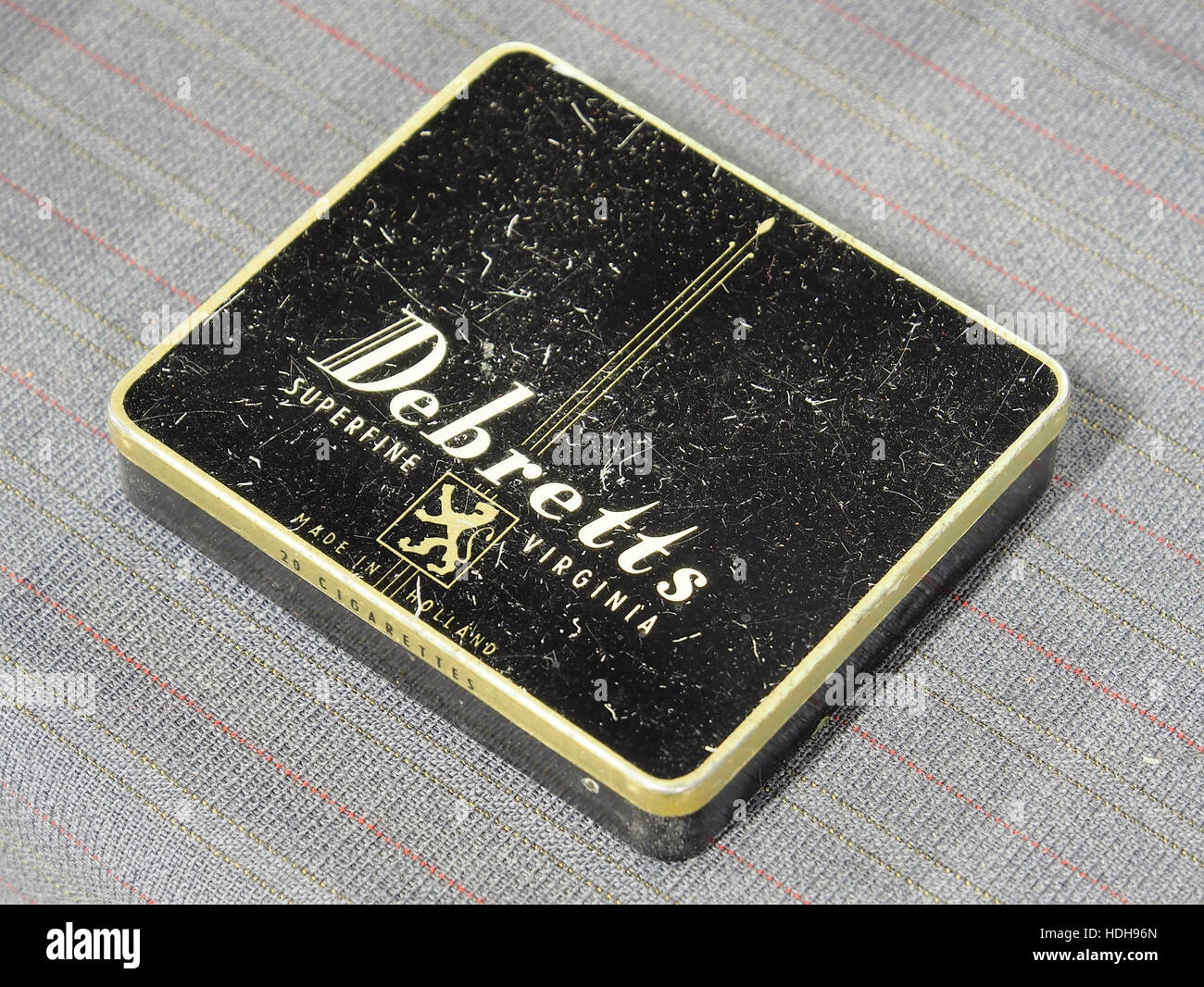 This vintage *Debretts* tin, originally used for storing biscuits or ...