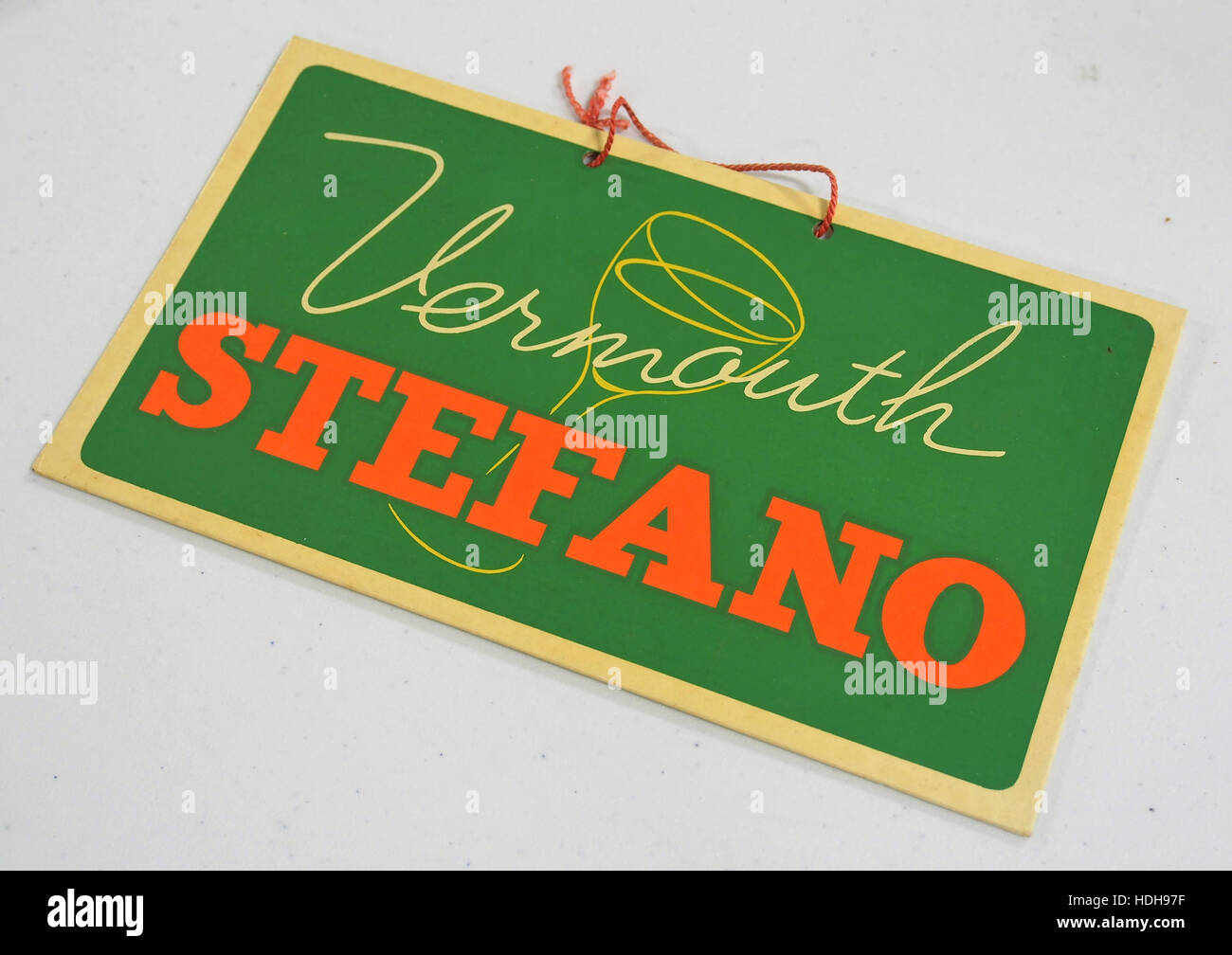 This image features an old tin container used for storing biscuits and ...