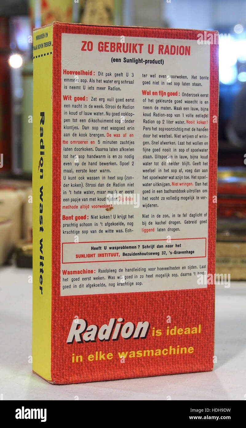 This image features a vintage tin storage container, originally used ...