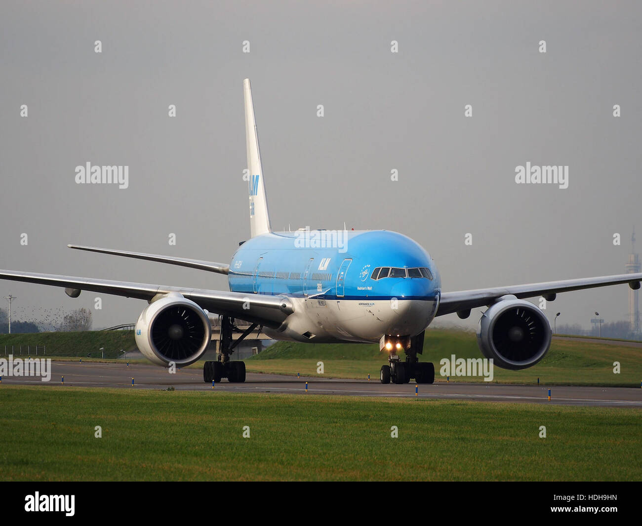 PH-BQH, a commercial aircraft, is seen taxiing after landing on runway ...