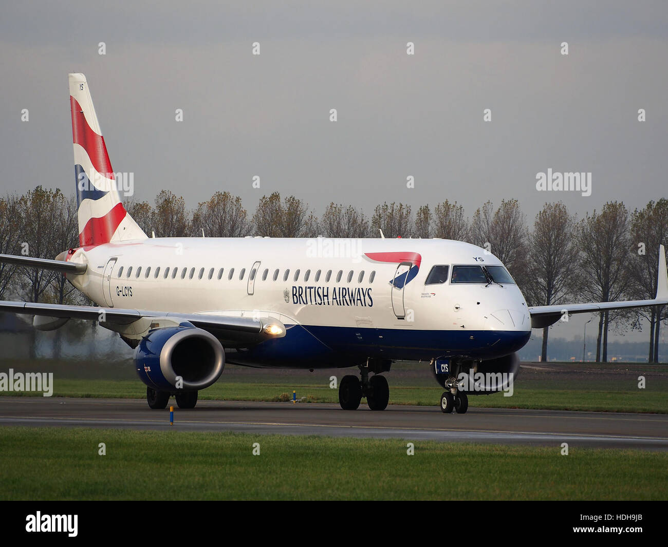 The aircraft G-LCYS is shown taxiing after landing on runway 18R. The ...