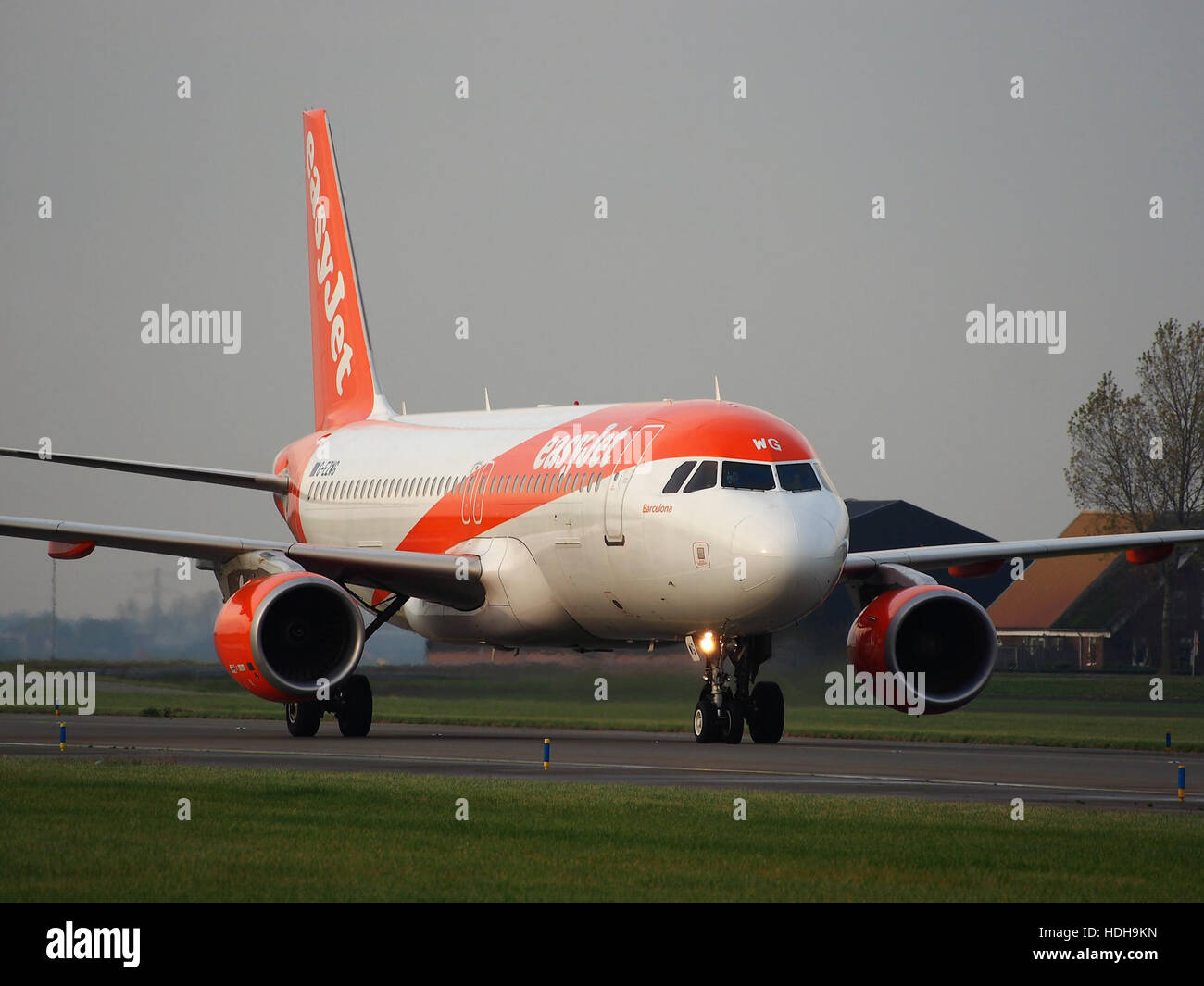 The aircraft G-EZWG taxiing after landing on runway 18R, captured in a ...