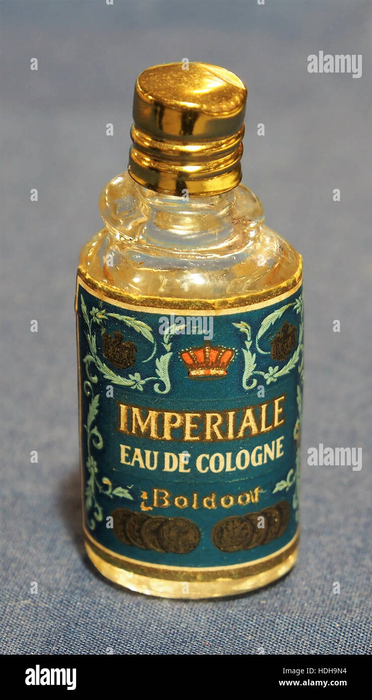 This image features an antique eau de Cologne bottle, showcasing ...