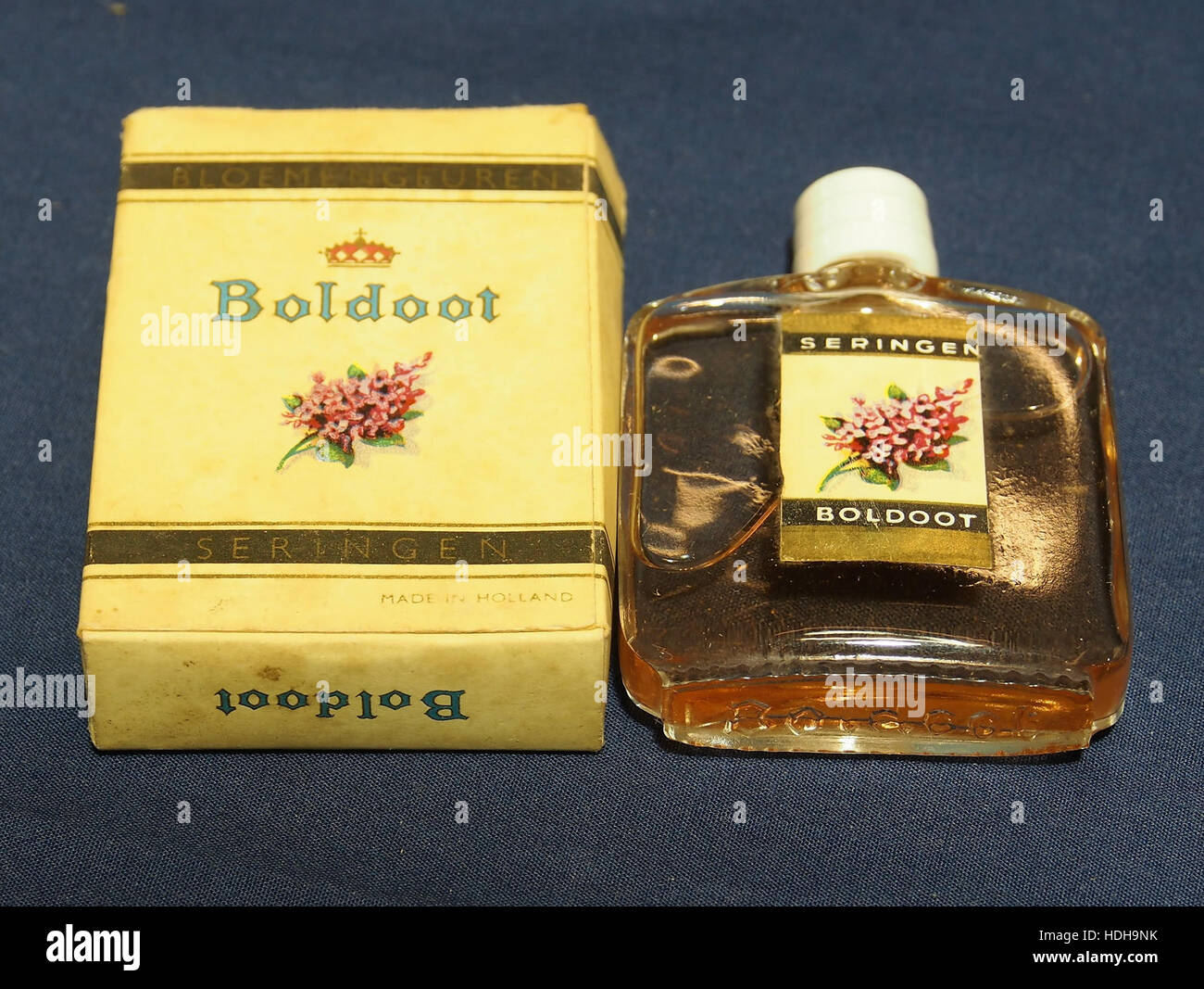 This image features a vintage bottle of Boldood antique eau de Cologne ...