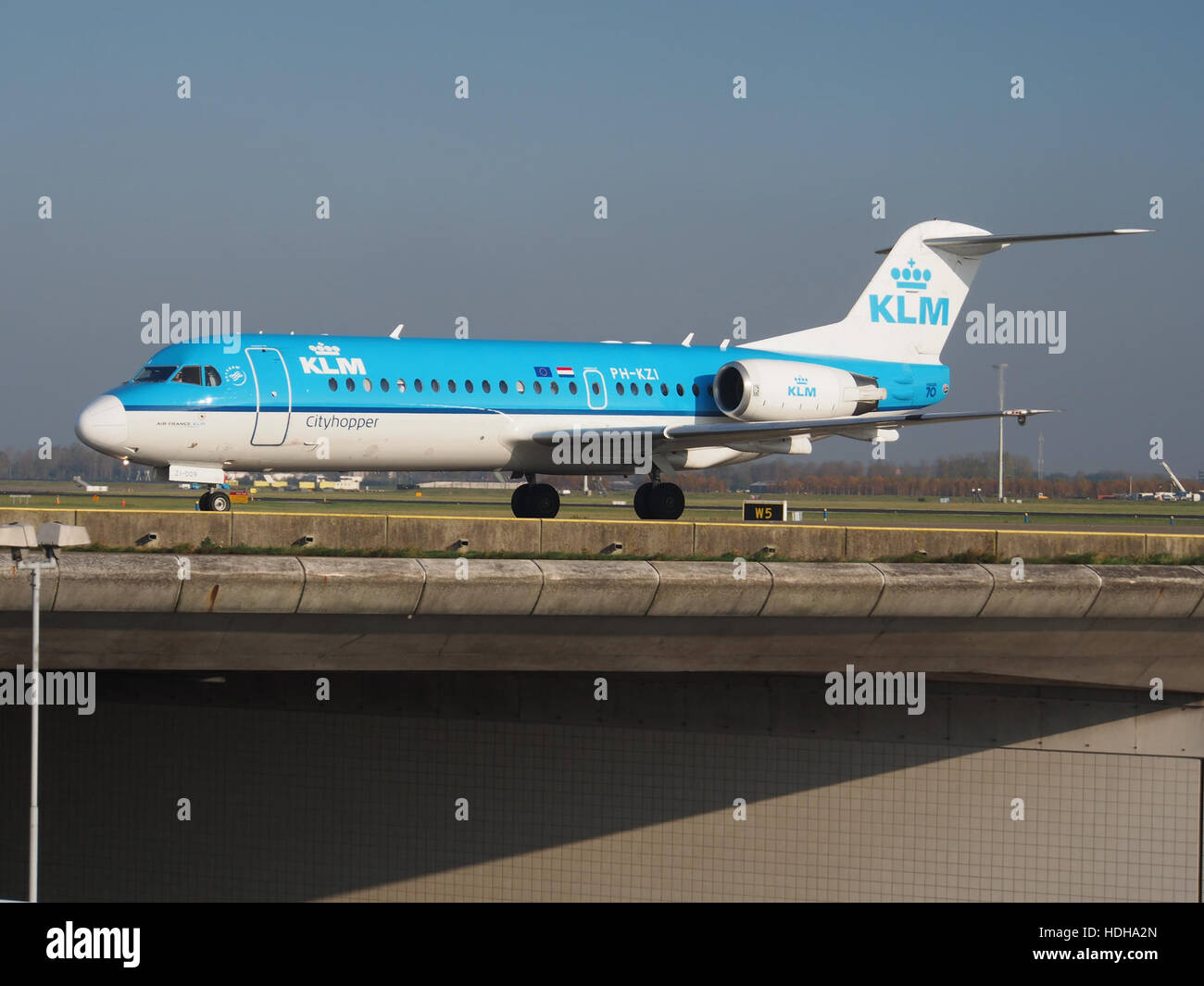 This image shows the KLM Cityhopper Fokker F70 (PH-KZI) crossing ...