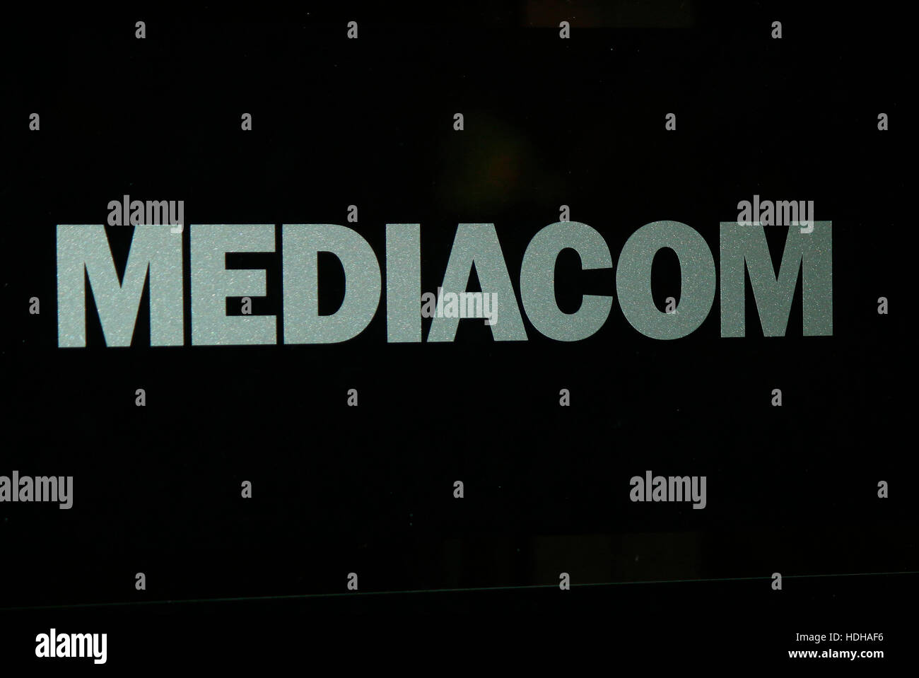 das Logo der Marke "Mediacom", Berlin Stock Photo - Alamy
