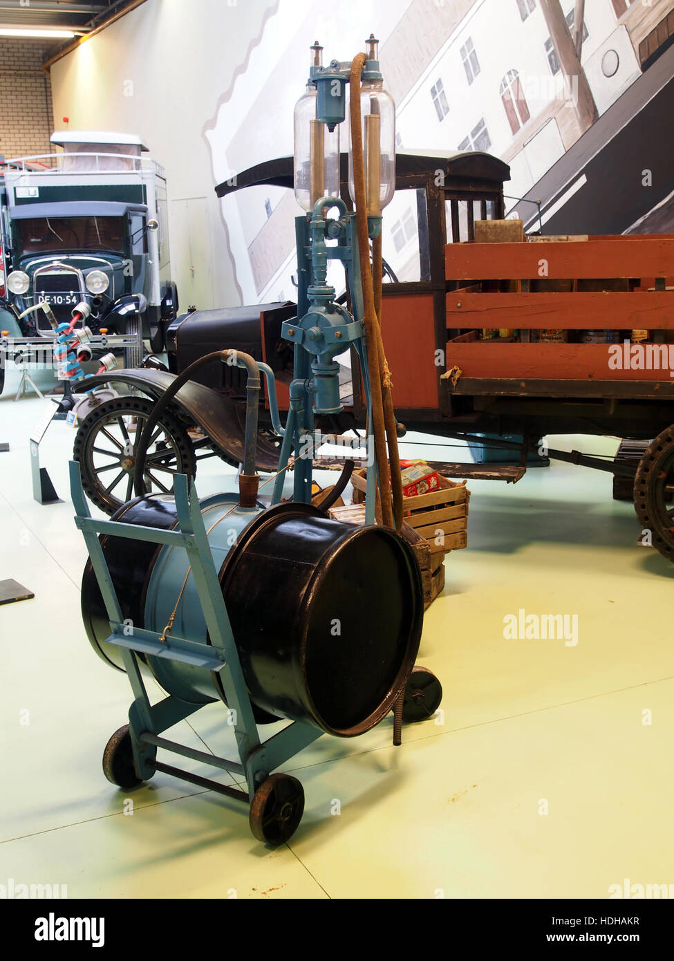 The image shows a traditional Hamdpomp, a Dutch water pump with a drum ...