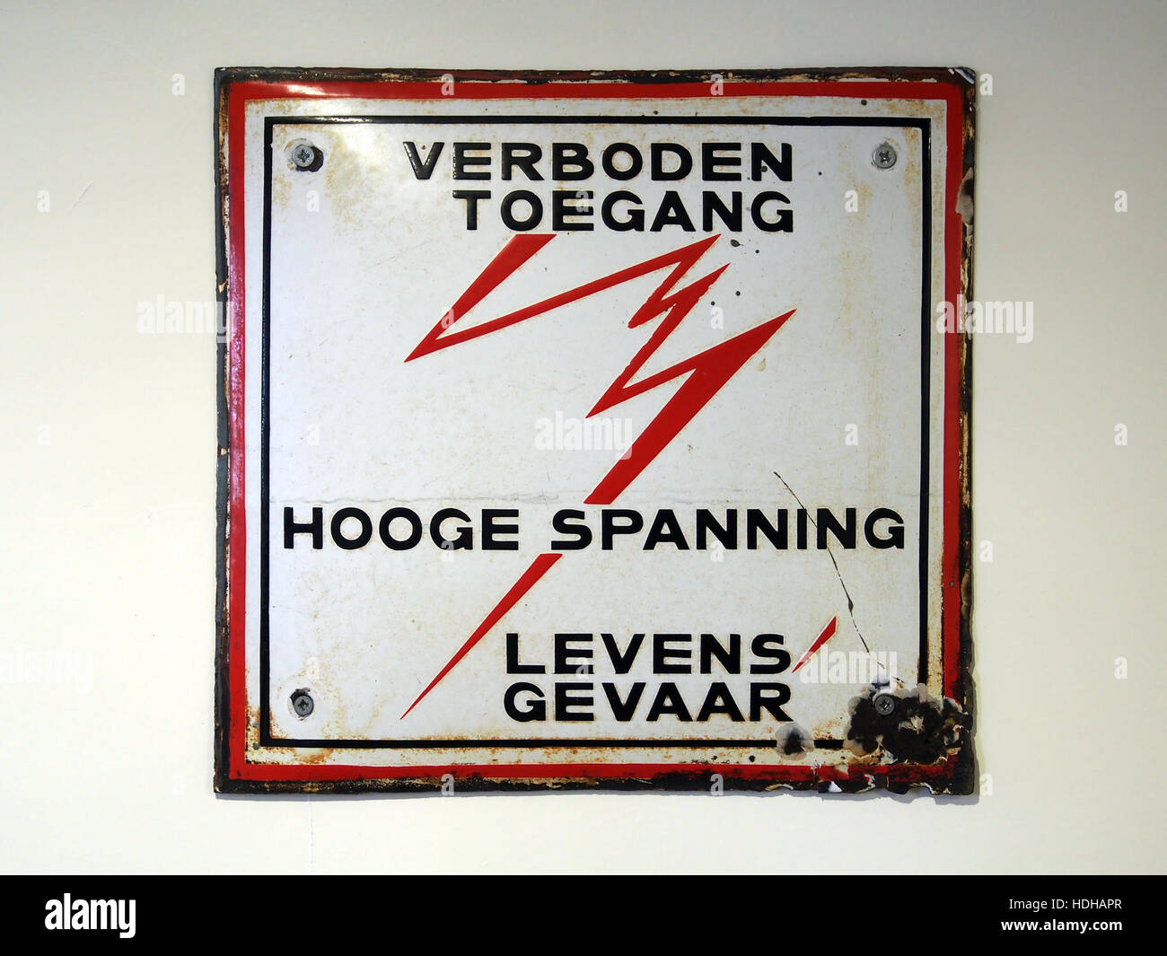 The enamel sign 'Verboden toegang Hoogspanning Levensgevaar' (No entry ...