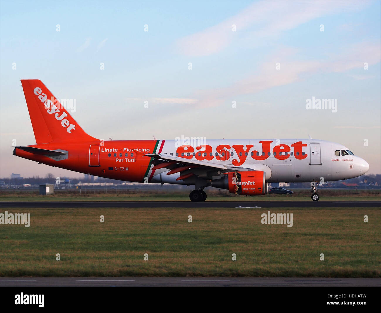 G-EZIW, a commercial aircraft, taxis on runway 18R after completing its ...