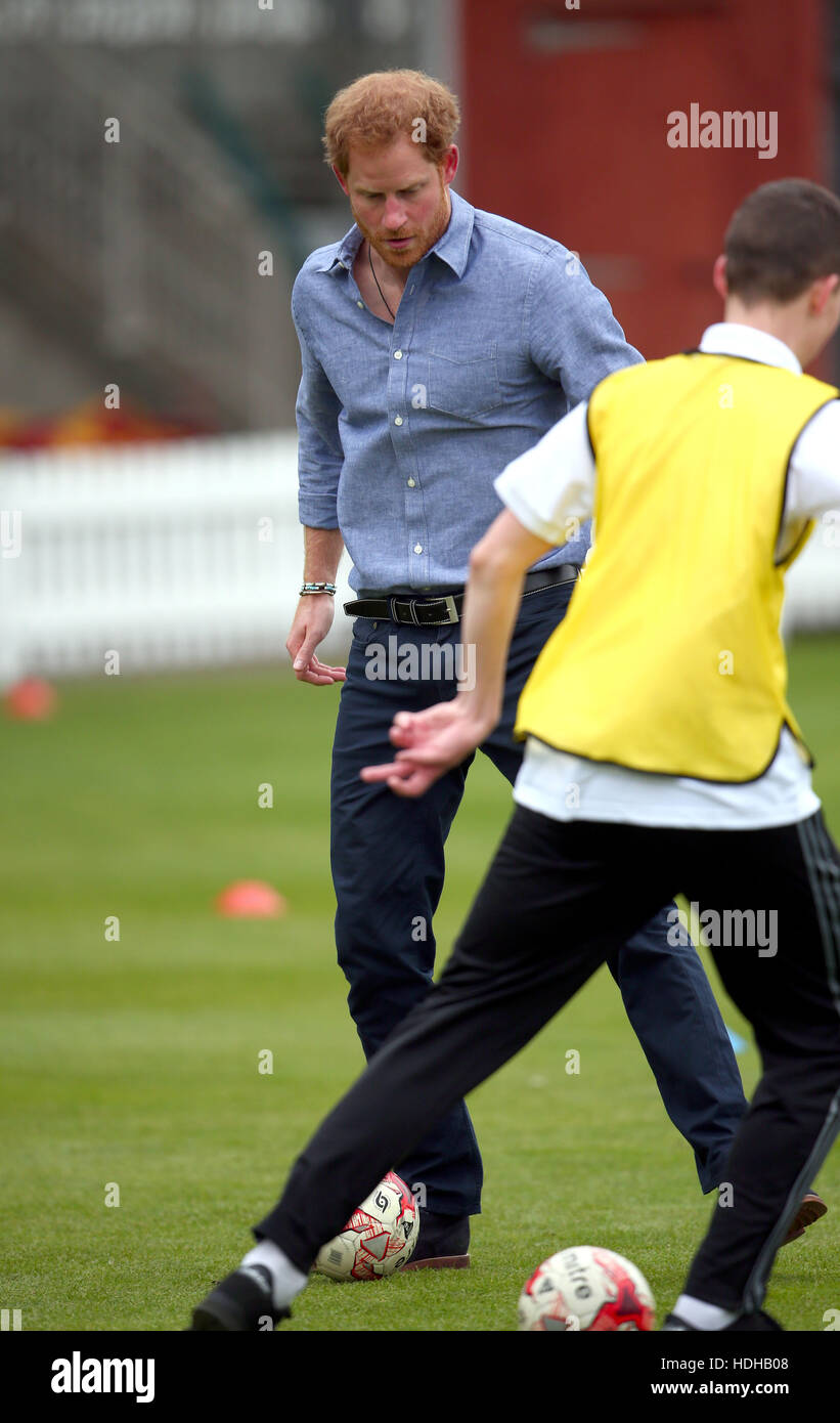 Prince Harry attends a cricket coaching session at Lords Cricket Ground ...