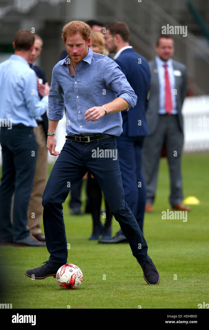 Prince Harry attends a cricket coaching session at Lords Cricket Ground ...