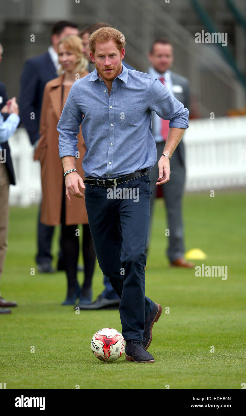 Prince Harry attends a cricket coaching session at Lords Cricket Ground ...
