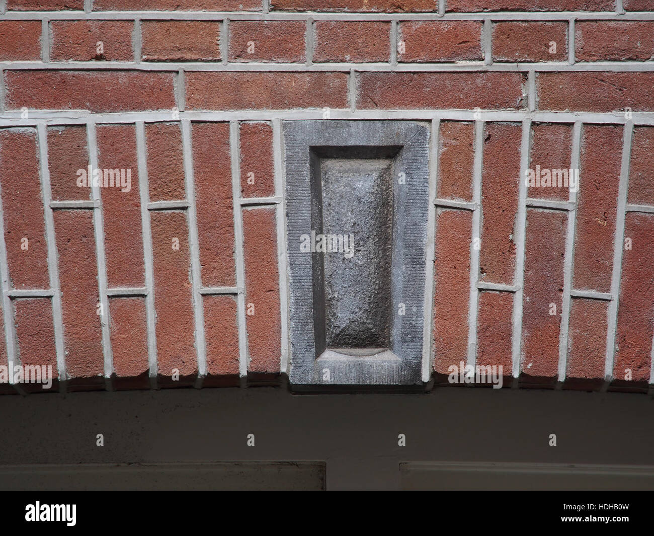 This image shows the 'sluitsteen' (keystone) from the building at ...