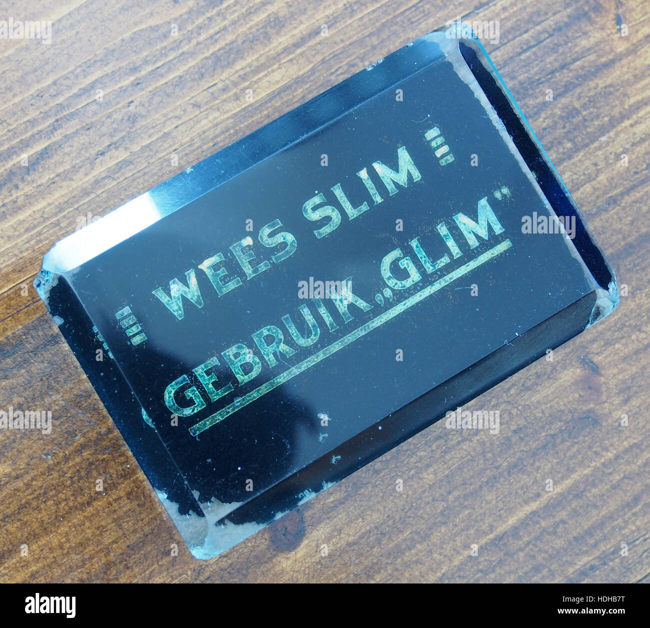 This image shows the advertisement for *Wees slim gebruik Glim presse ...