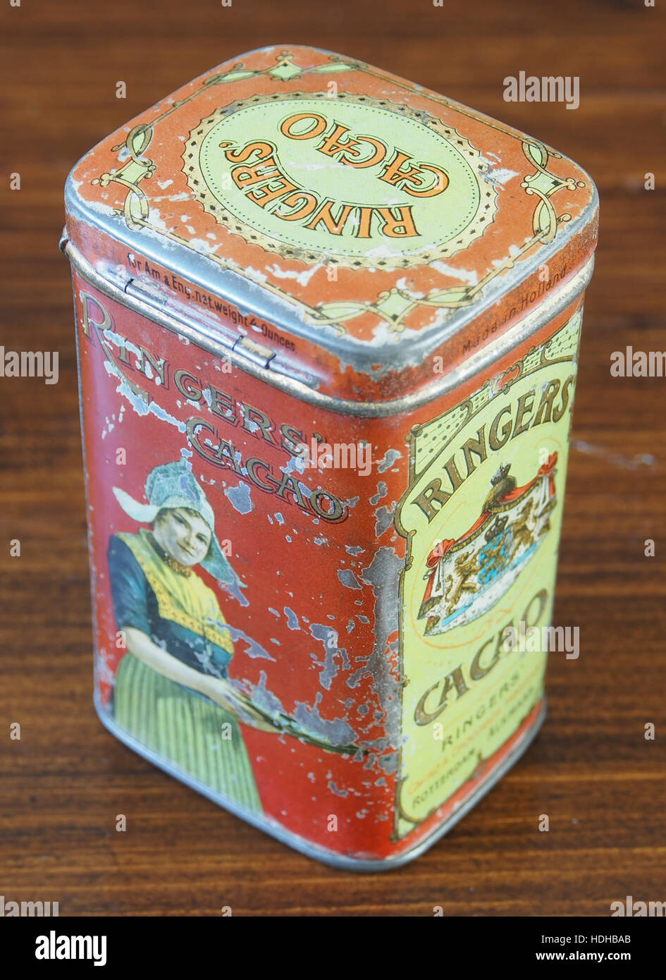 A vintage Ringers cacao tin, featuring early 20th-century Dutch ...