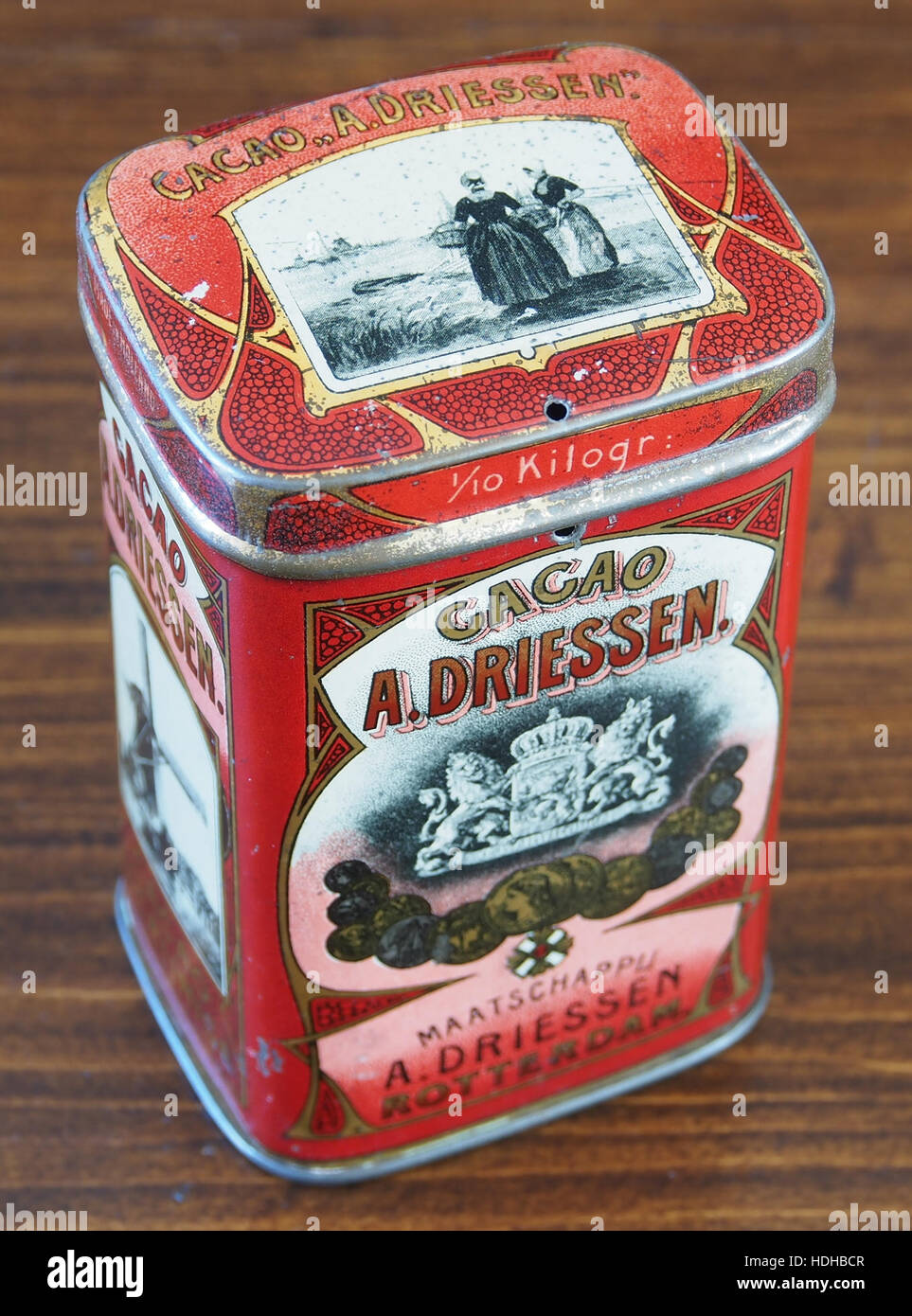The image shows a vintage tin can of Cacao A Driessen, a well-known ...