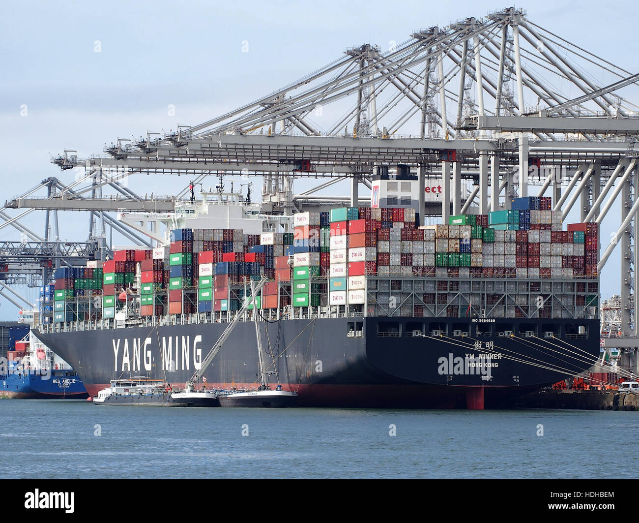 A photograph of the YM Winner, a container ship, in port at Rotterdam's ...