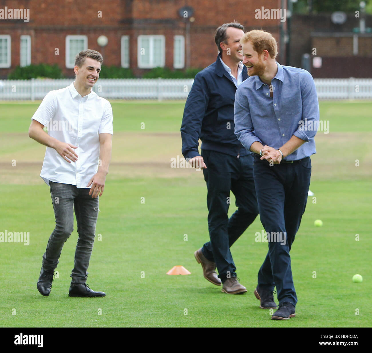 Prince Harry attends a cricket coaching session at Lord's Cricket ...