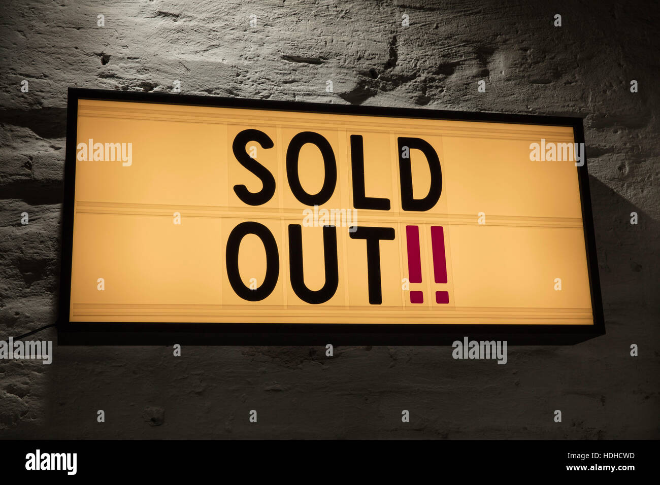 Close-up of Sold Out signboard against gray wall Stock Photo - Alamy