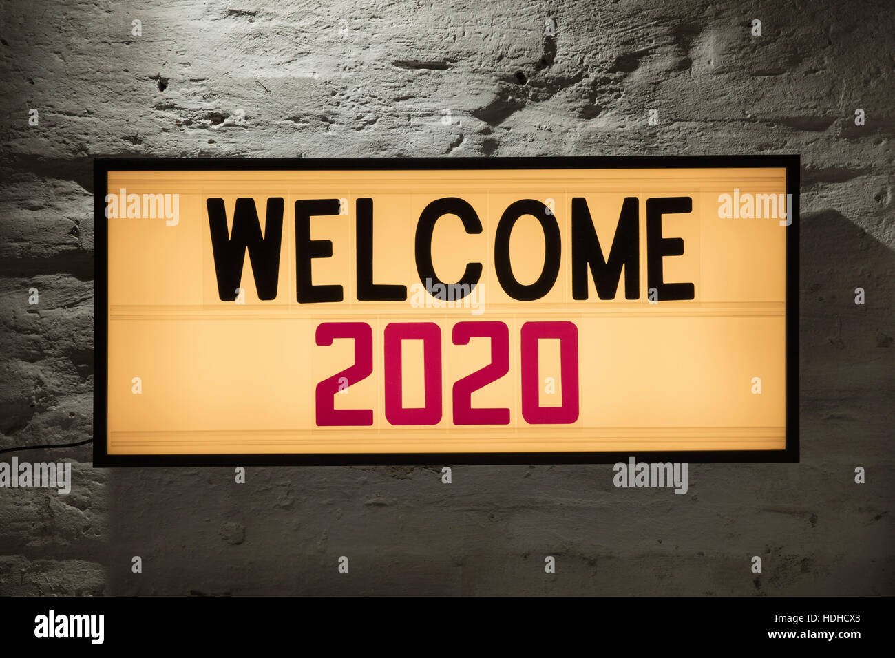 Close-up of Welcome 2020 signboard against gray wall Stock Photo - Alamy