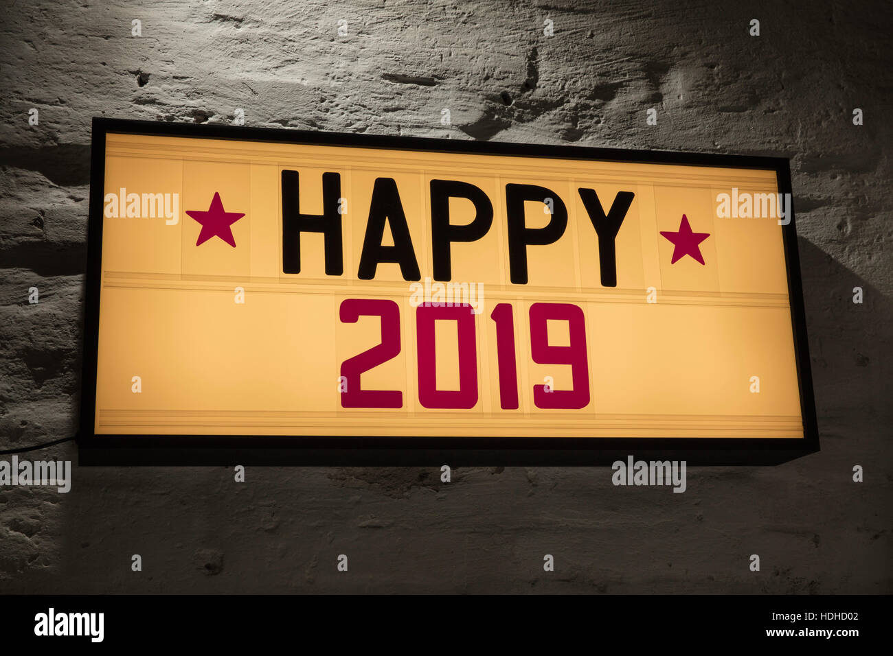 Close-up of Happy 2019 signboard against gray wall Stock Photo - Alamy