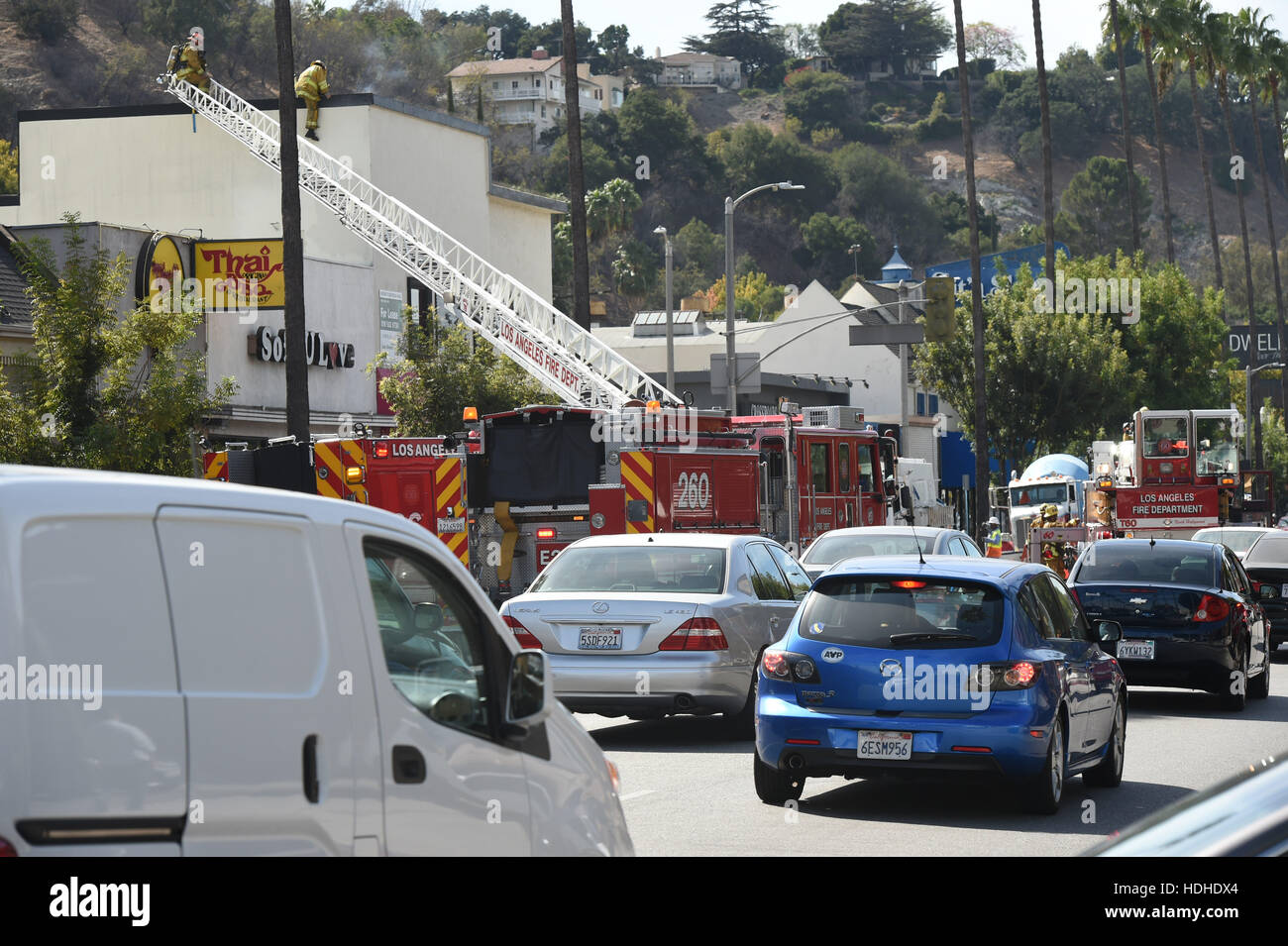 LAFD firefighters respond to an attic fire in an unoccupied building on ...