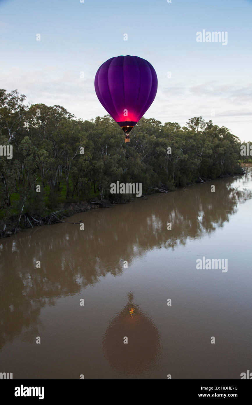 Green balloon in sky over tree hi-res stock photography and images - Alamy