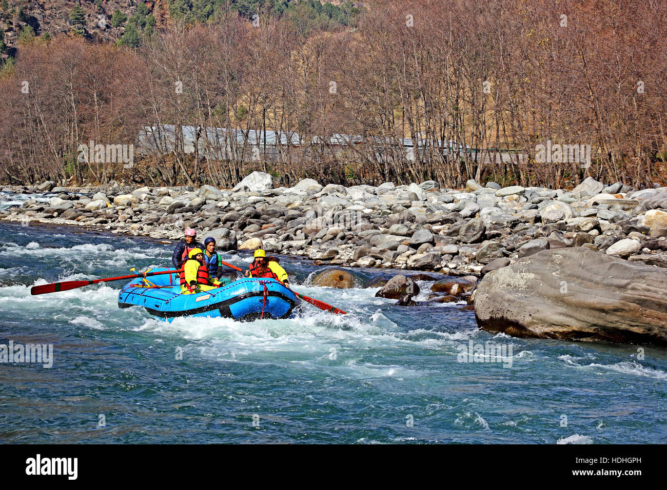 Tourists enjoying white water rafting in the Himalayas at the Beas ...