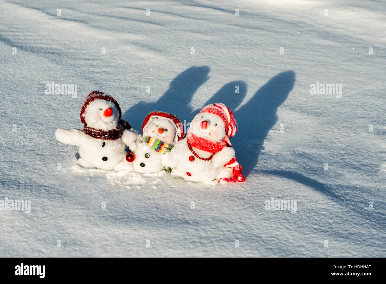 Happy snowman family Stock Photo - Alamy