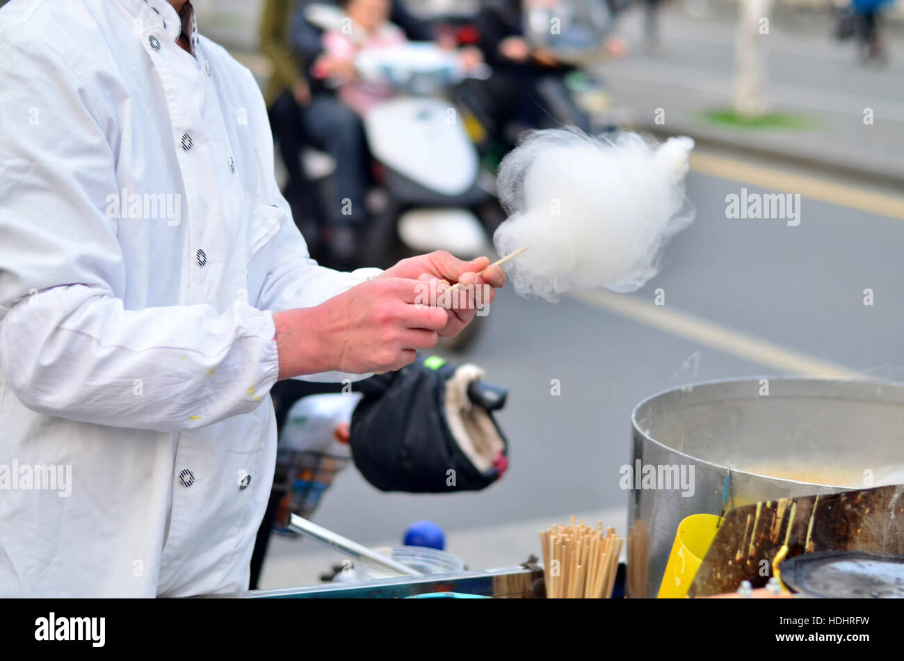 Making cotton candy Stock Photo - Alamy