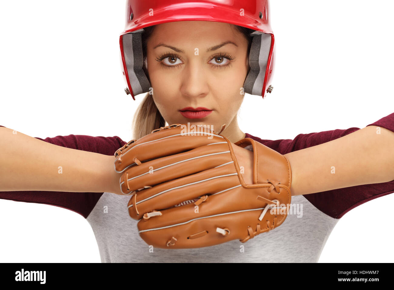 Female baseball player ready to pitch isolated on white background ...