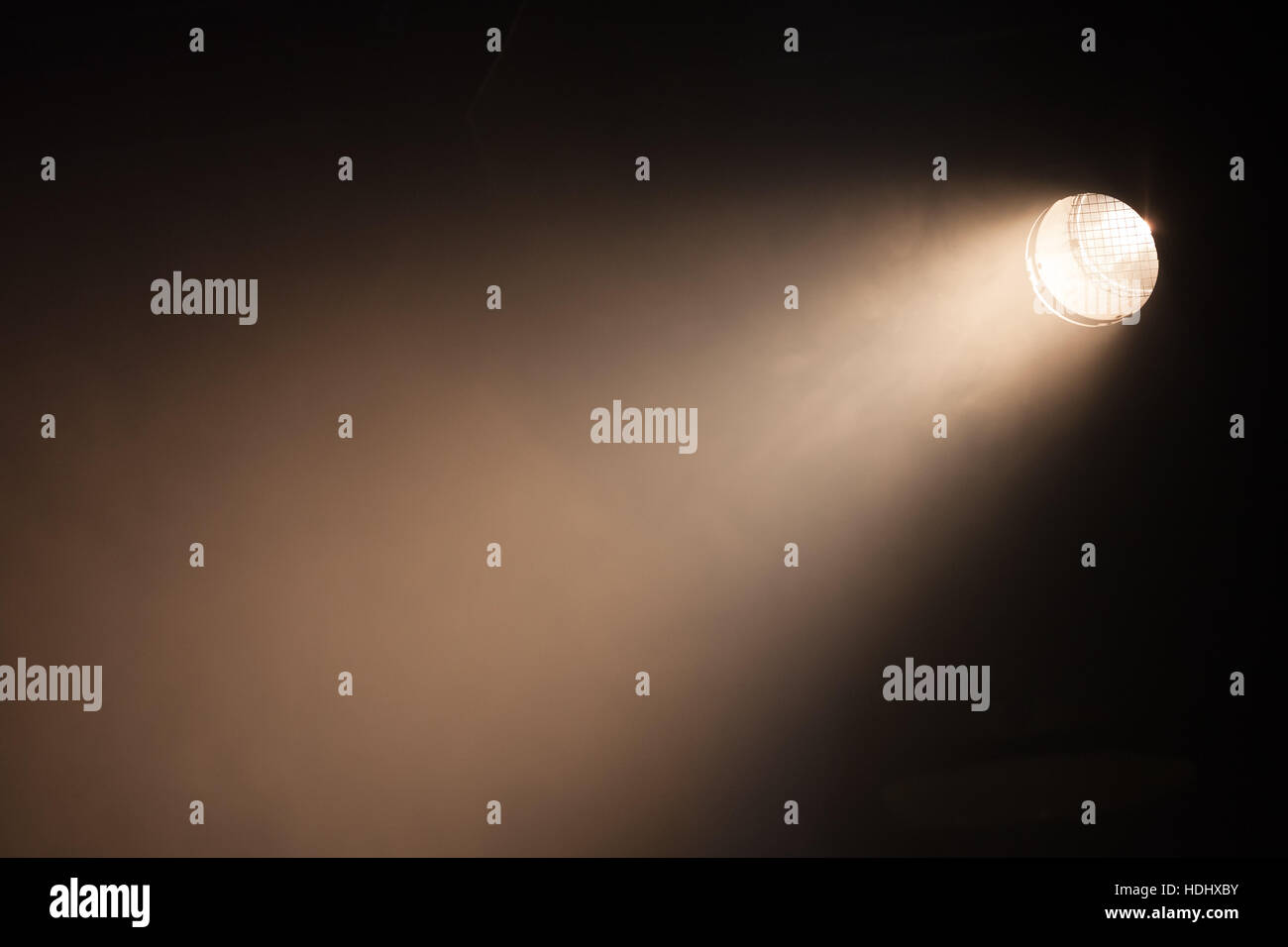 Ray of scenic spot light over dark background, stage illumination ...