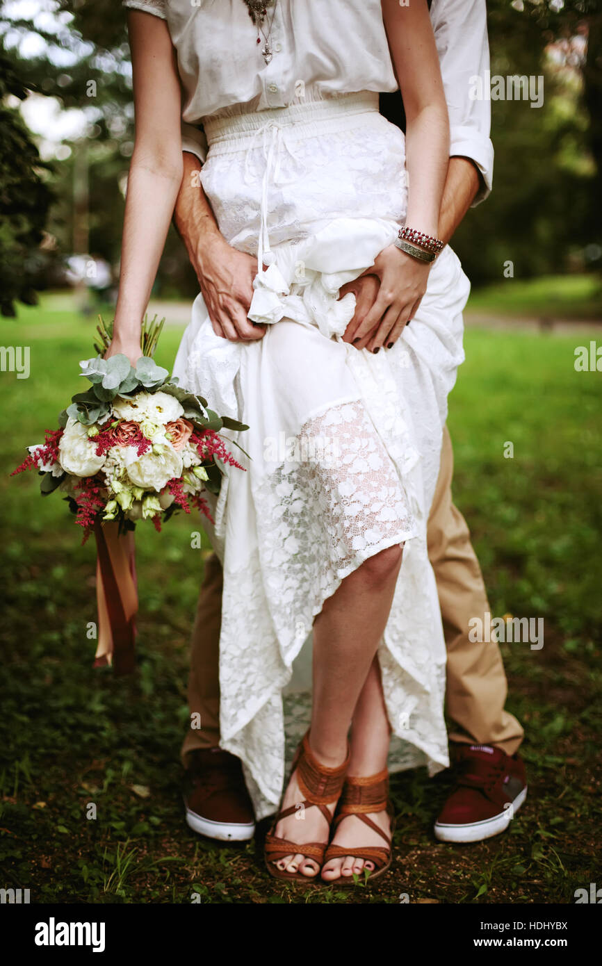 Legs of wedding couple close-up, freedom concept. Wedding couple ...