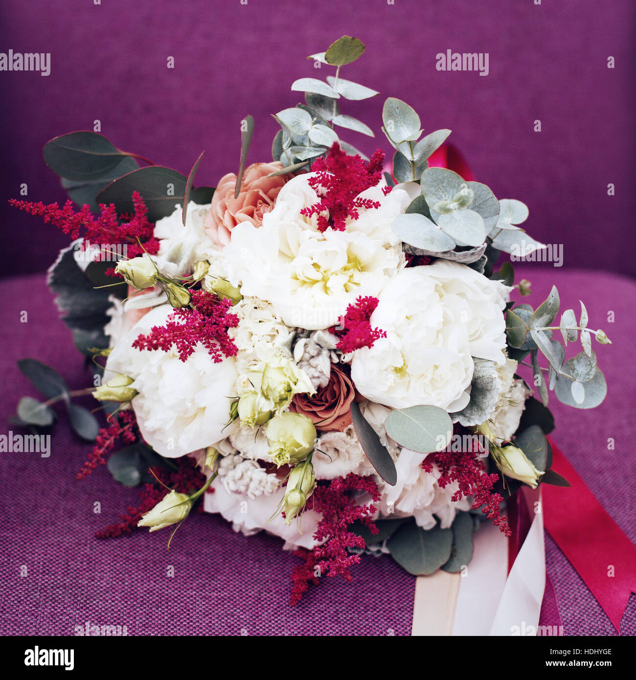 Wedding rustic flowers on purple background Stock Photo - Alamy