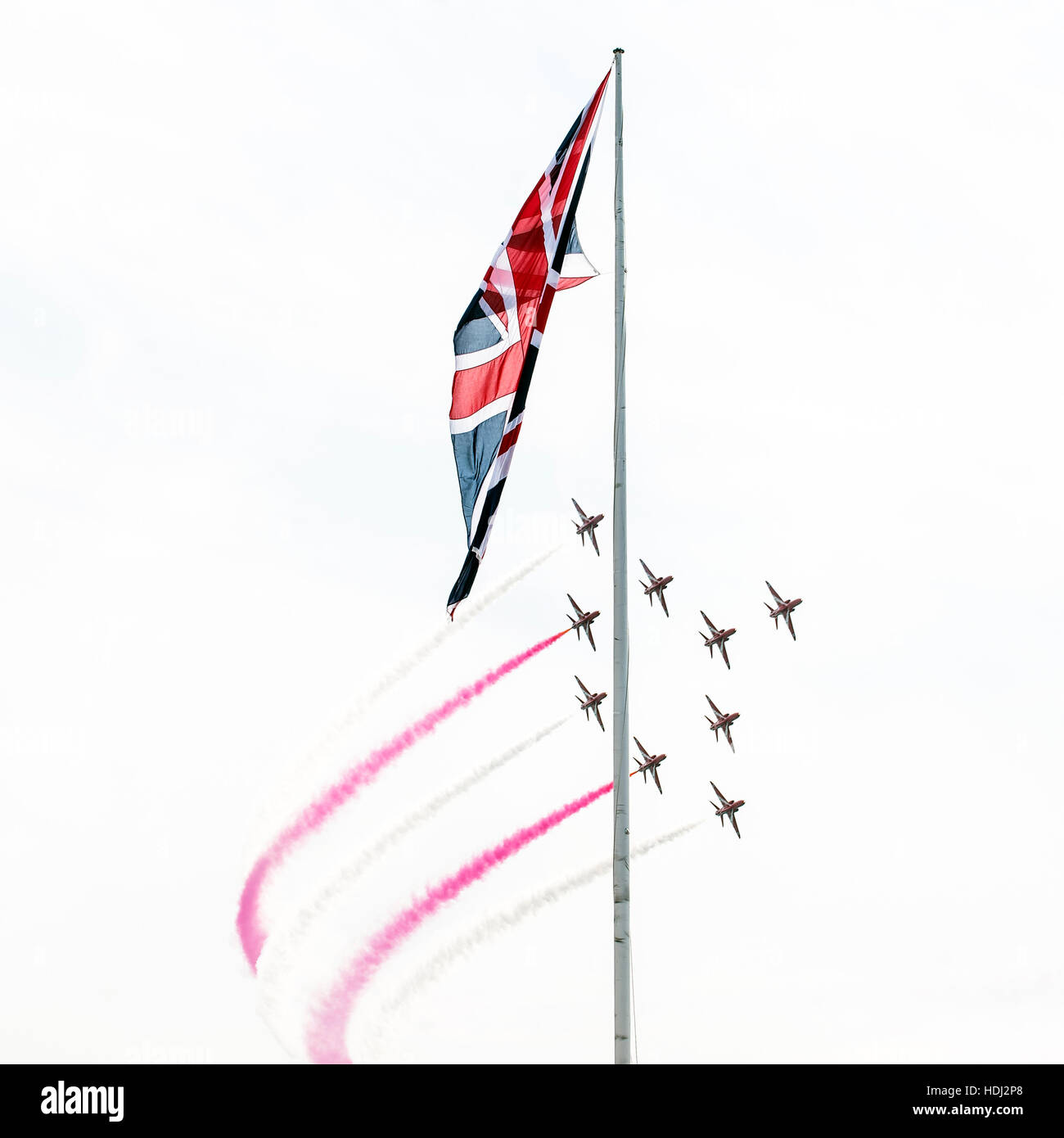 Red Arrows fly past Stock Photo - Alamy