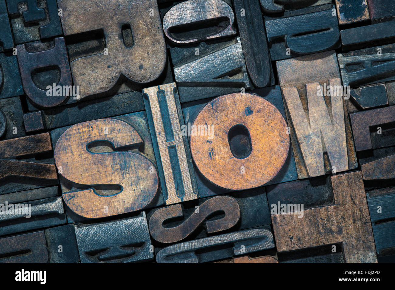 show word made from wooden letterpress blocks inside many letters ...