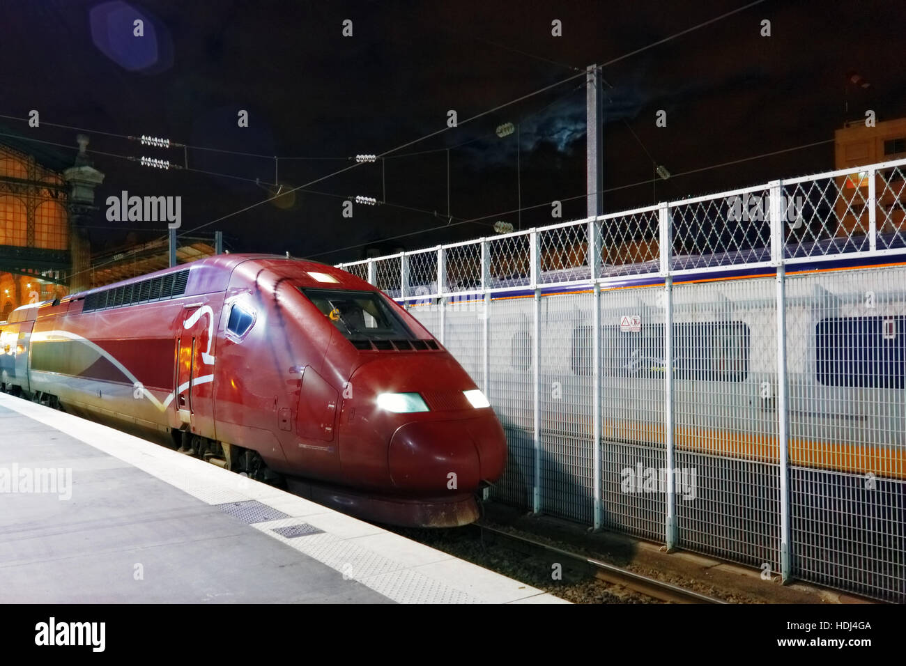 Modern Fast Passenger Train train at the station. Paris. France Stock ...