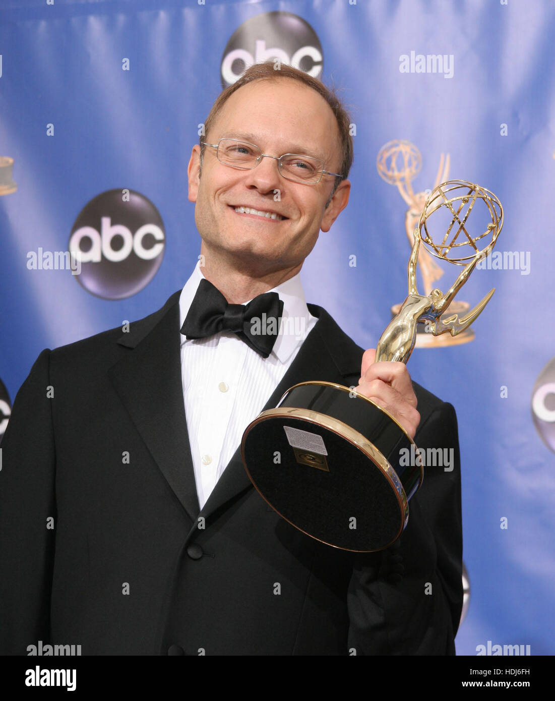 Actor David Hyde Pierce holds his Emmy for outstanding supporting actor ...