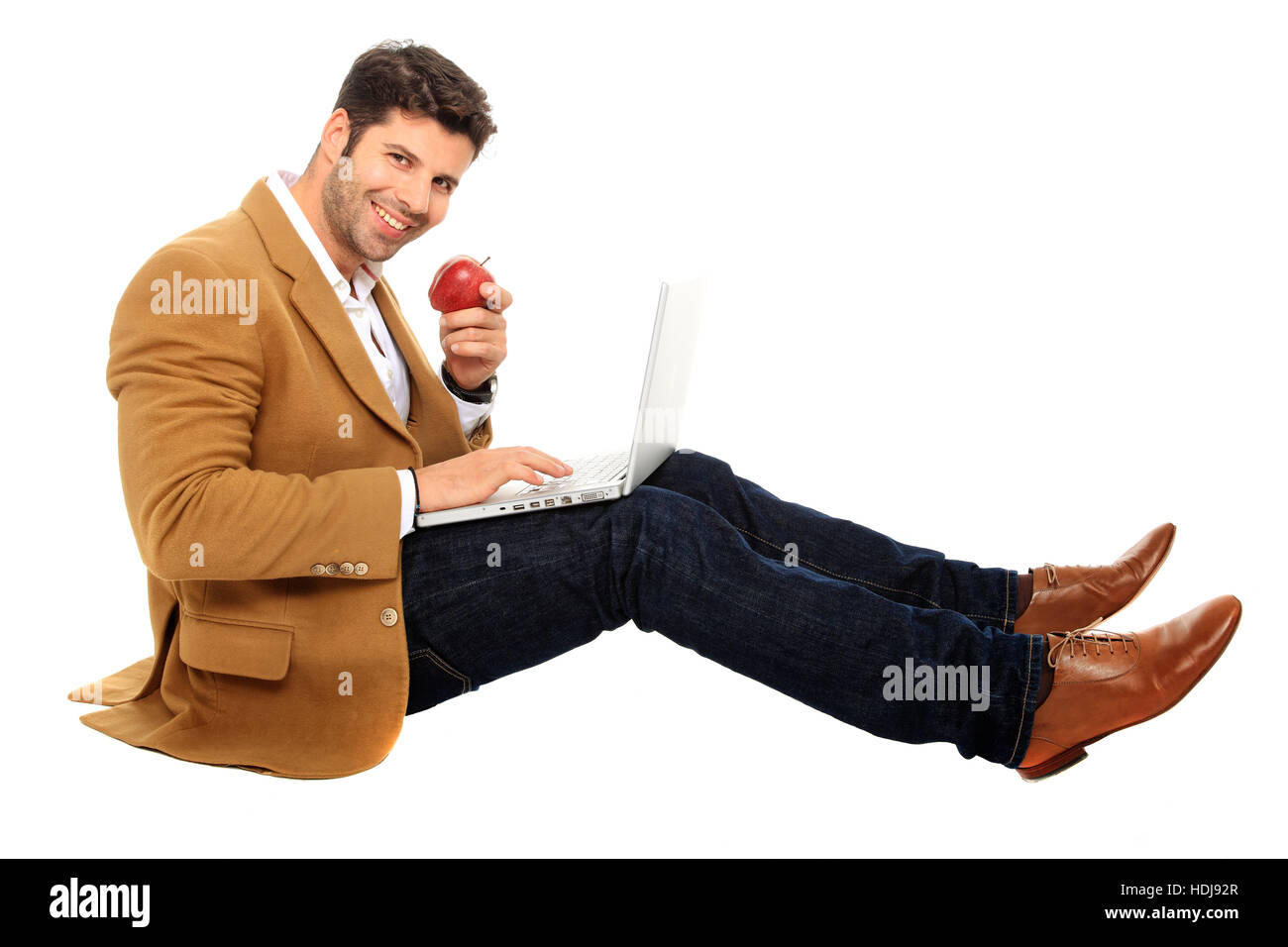 Young guy in office on computer Cut Out Stock Images & Pictures - Alamy