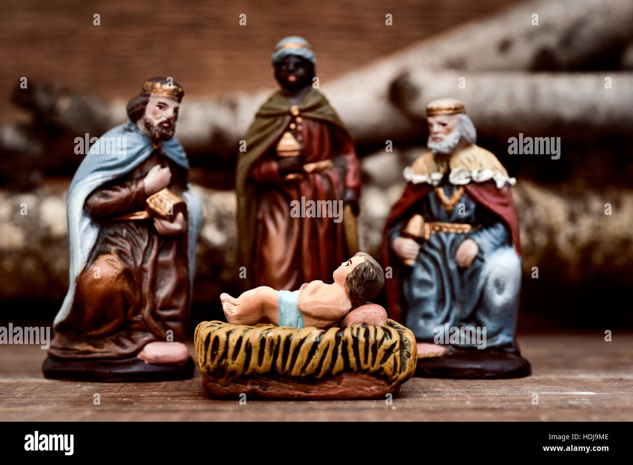 closeup of the three kings carrying their gifts adoring the Child Jesus ...