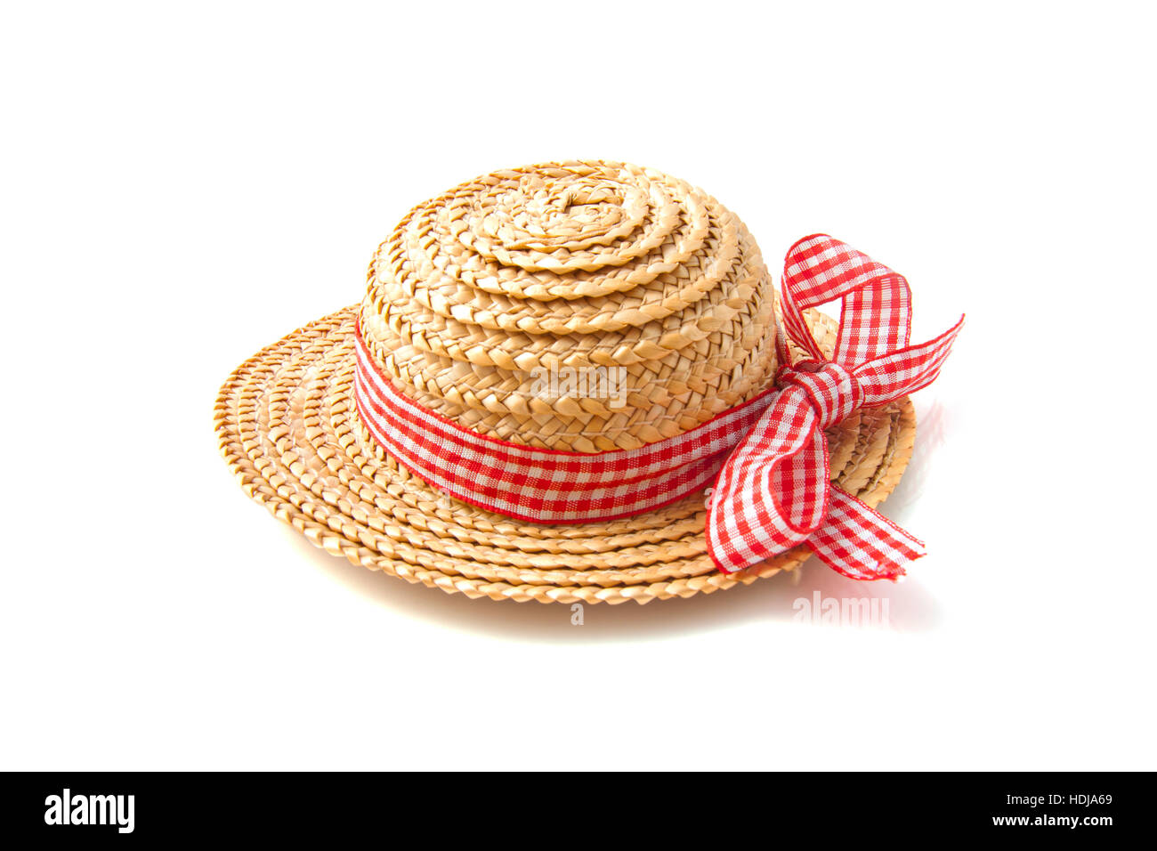 Lovely straw hat with chequered ribbon isolated over white Stock Photo ...