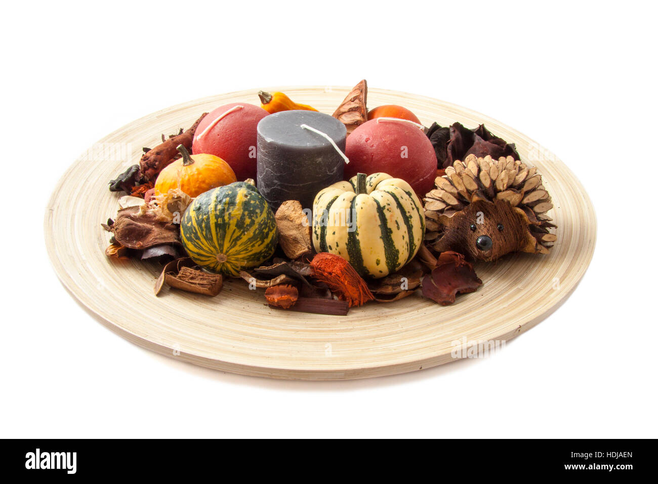 Wooden plate with decorated stuff isolated over white Stock Photo - Alamy