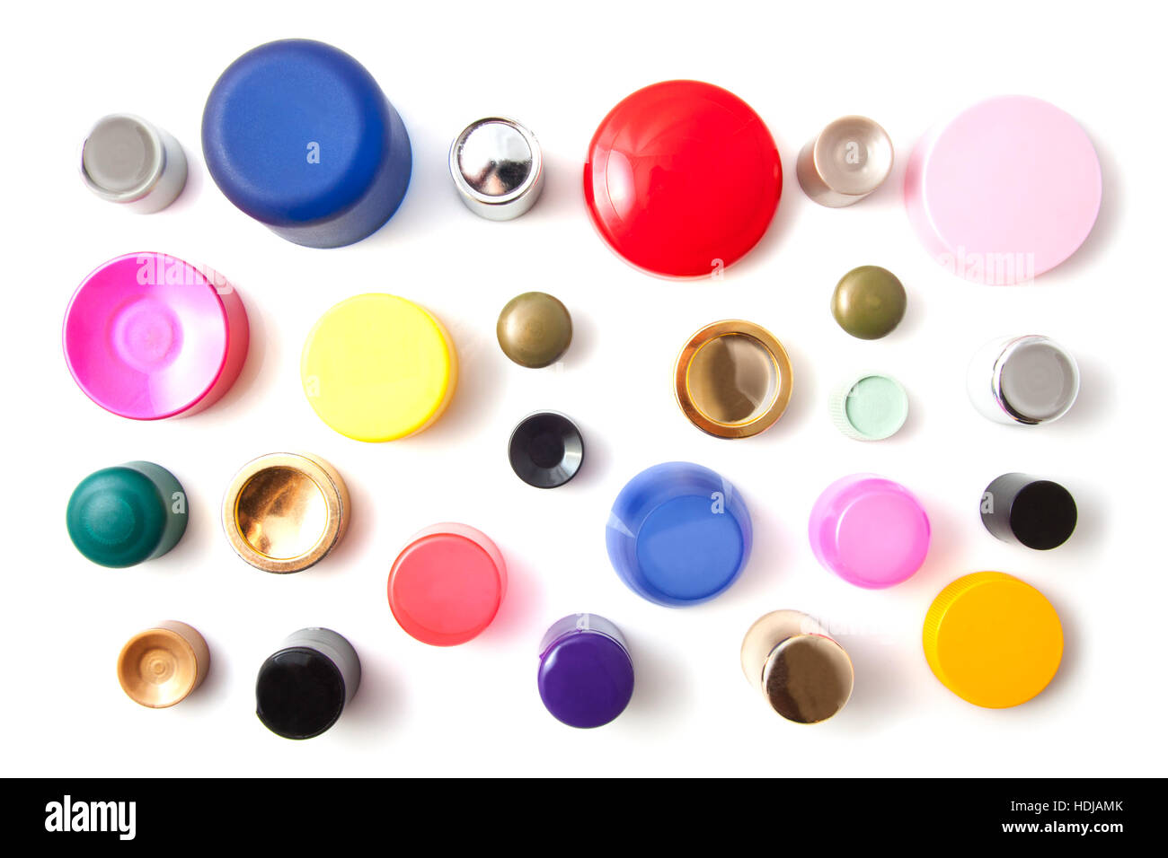 Arrangement of colorful caps isolated over white Stock Photo - Alamy