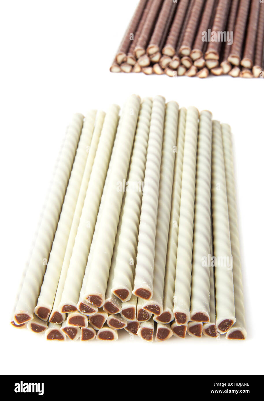 Brown and white filled chocolate sticks for background use Stock Photo ...