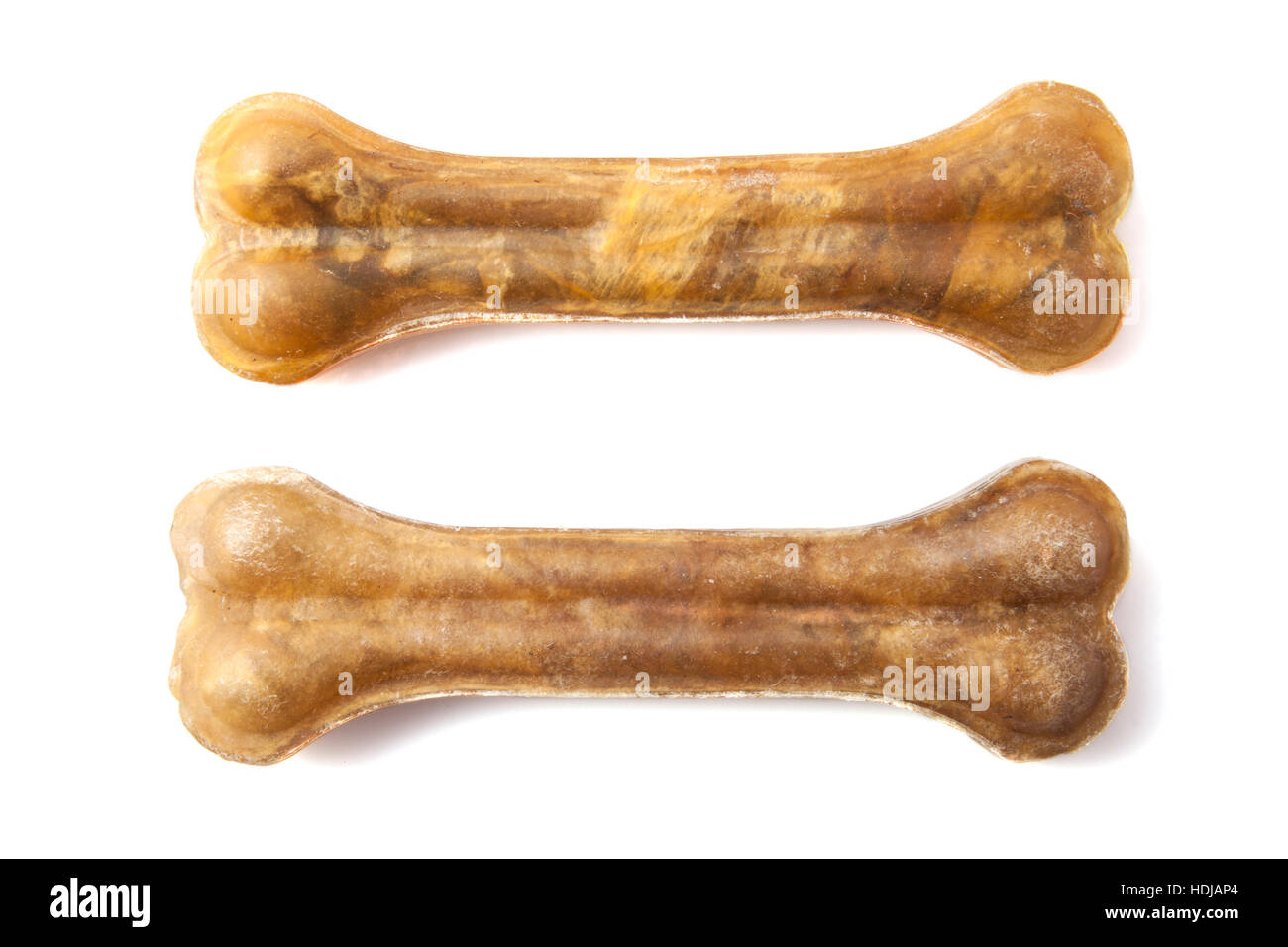 Two bones closeup for a dog isolated on a white background Stock Photo ...