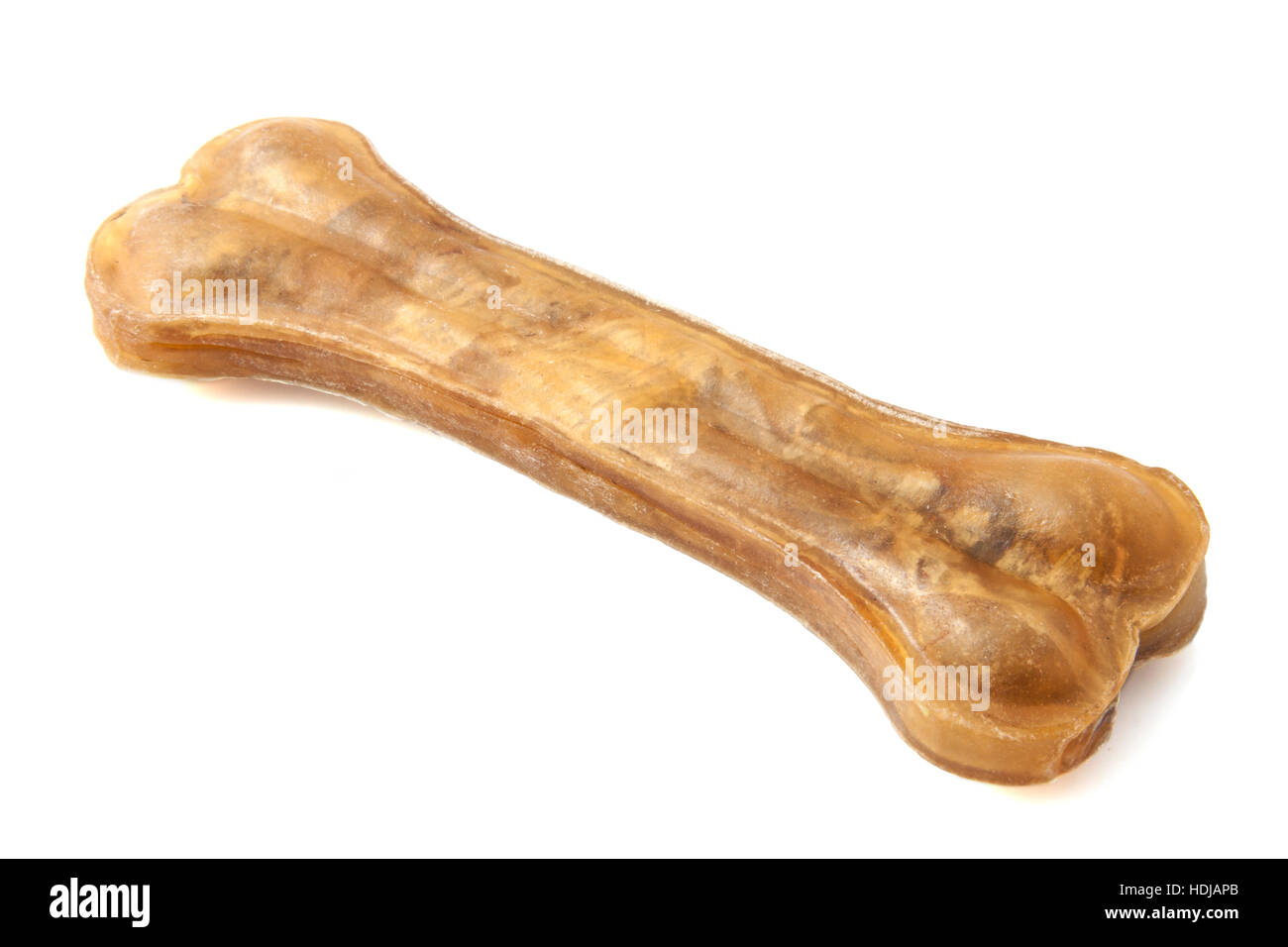 Big bone for a dog isolated over white Stock Photo - Alamy