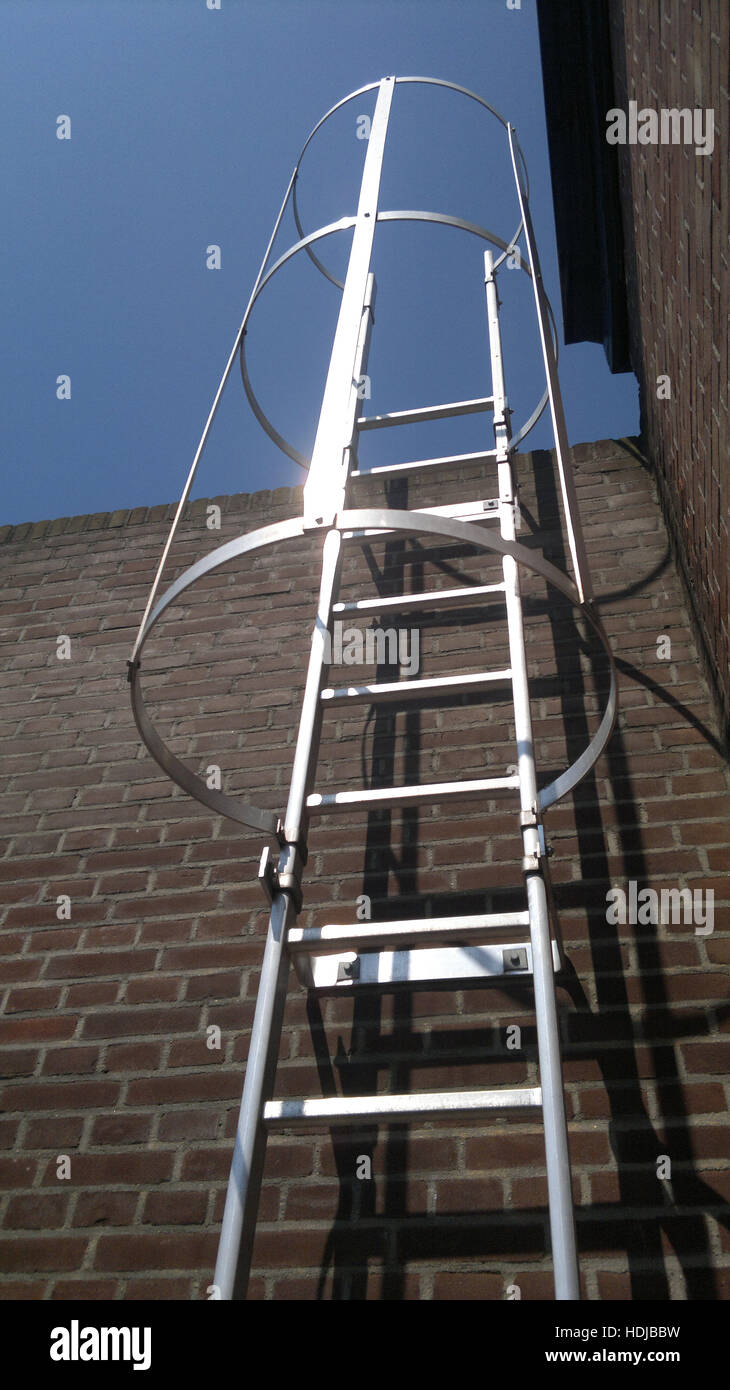 Fire steps wall mounted with blue skies Stock Photo - Alamy