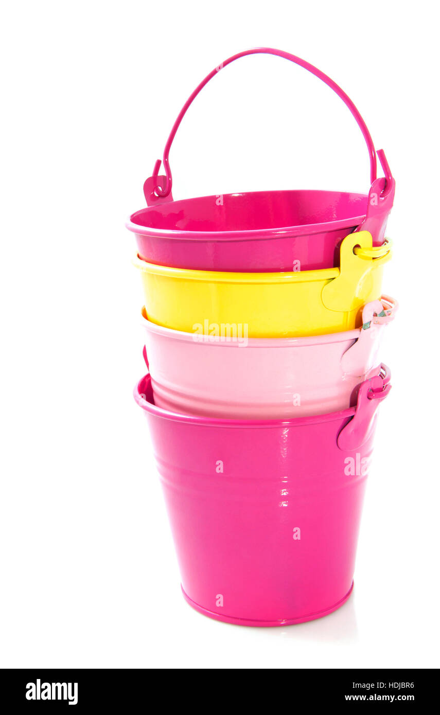 Four colorful buckets on a pile isolated over white Stock Photo - Alamy