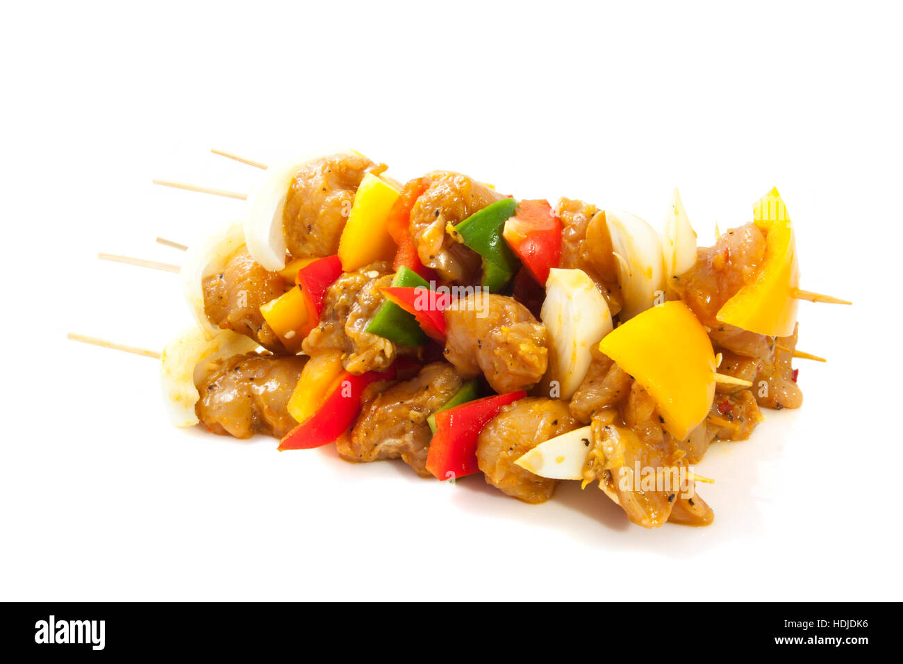 Fresh kebab sticks on a pile isolated over white Stock Photo - Alamy